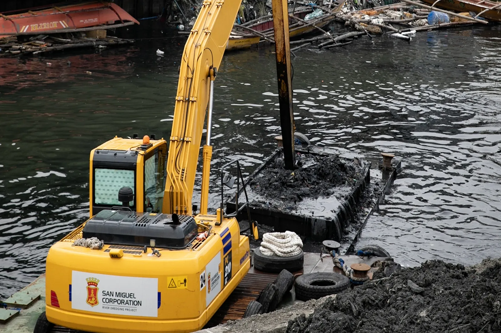 SMC, NNIC joint river cleanups help ease flooding at NAIA, nearby areas